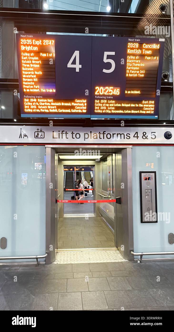 London UK 19th June 2029. Wheelchair user descending an inclined ...