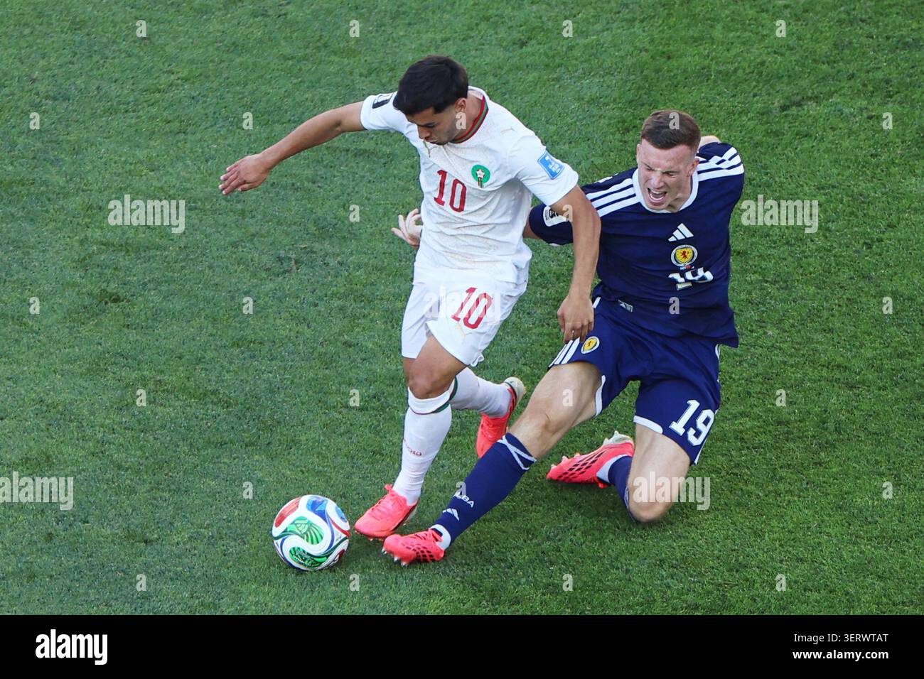 Morocco's Brahim Diaz (10) and Scotland's Lewis Ferguson (19) battle ...