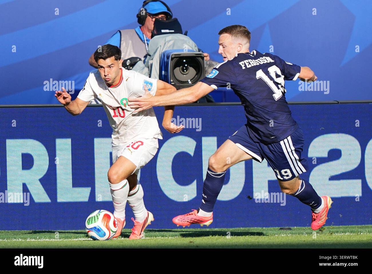 Scotland's Lewis Ferguson, right, challenges Morocco's Brahim Diaz ...