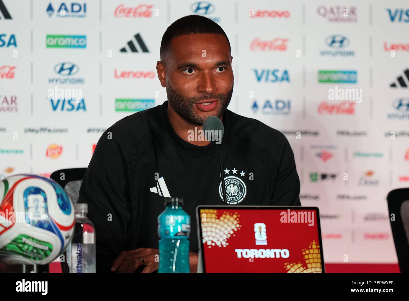 Germany's Jonathan Tah speaks during a news conference on the eve of ...