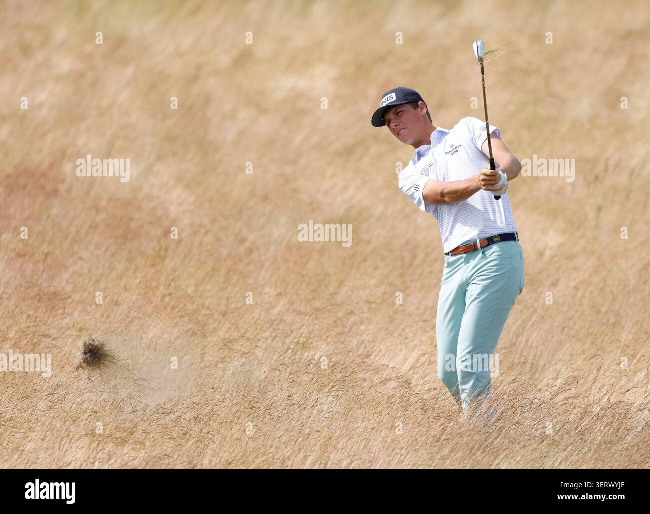 Mason Howell hits out of the fescue on the 18th hole in the second ...