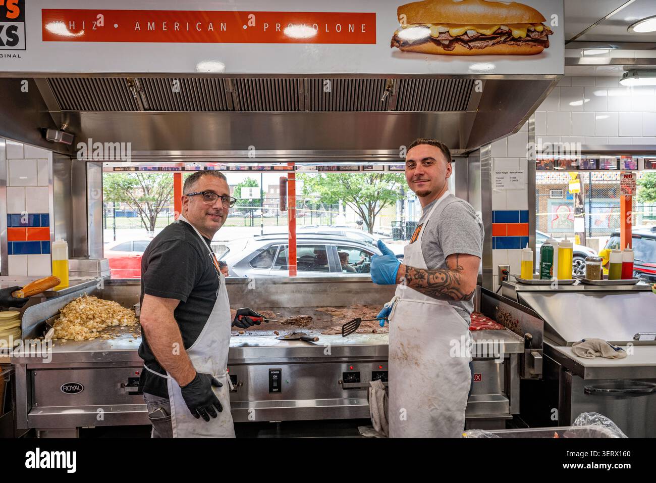 Cheesesteaks from the famous Geno's steaks being prepared in ...