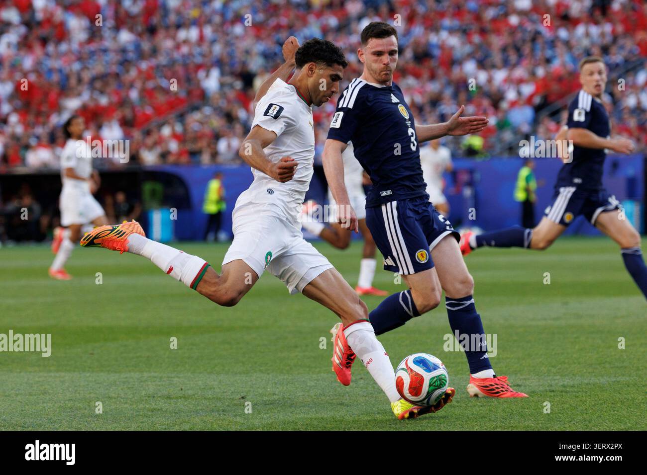 Morocco midfielder Brahim Diaz and Scotland defender Andrew Robertson ...