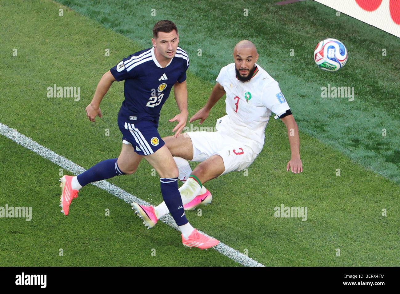 Scotland's Kenny McLean (23) and Morocco's Noussair Mazraoui (3) battle ...