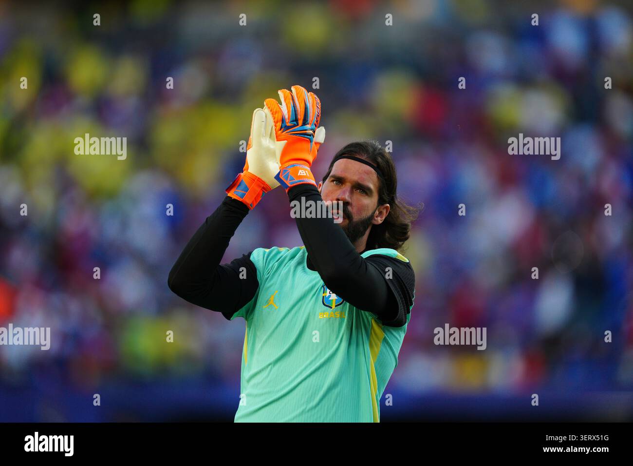 Brazil goalkeeper Alisson Becker warms up before the World Cup Group C ...