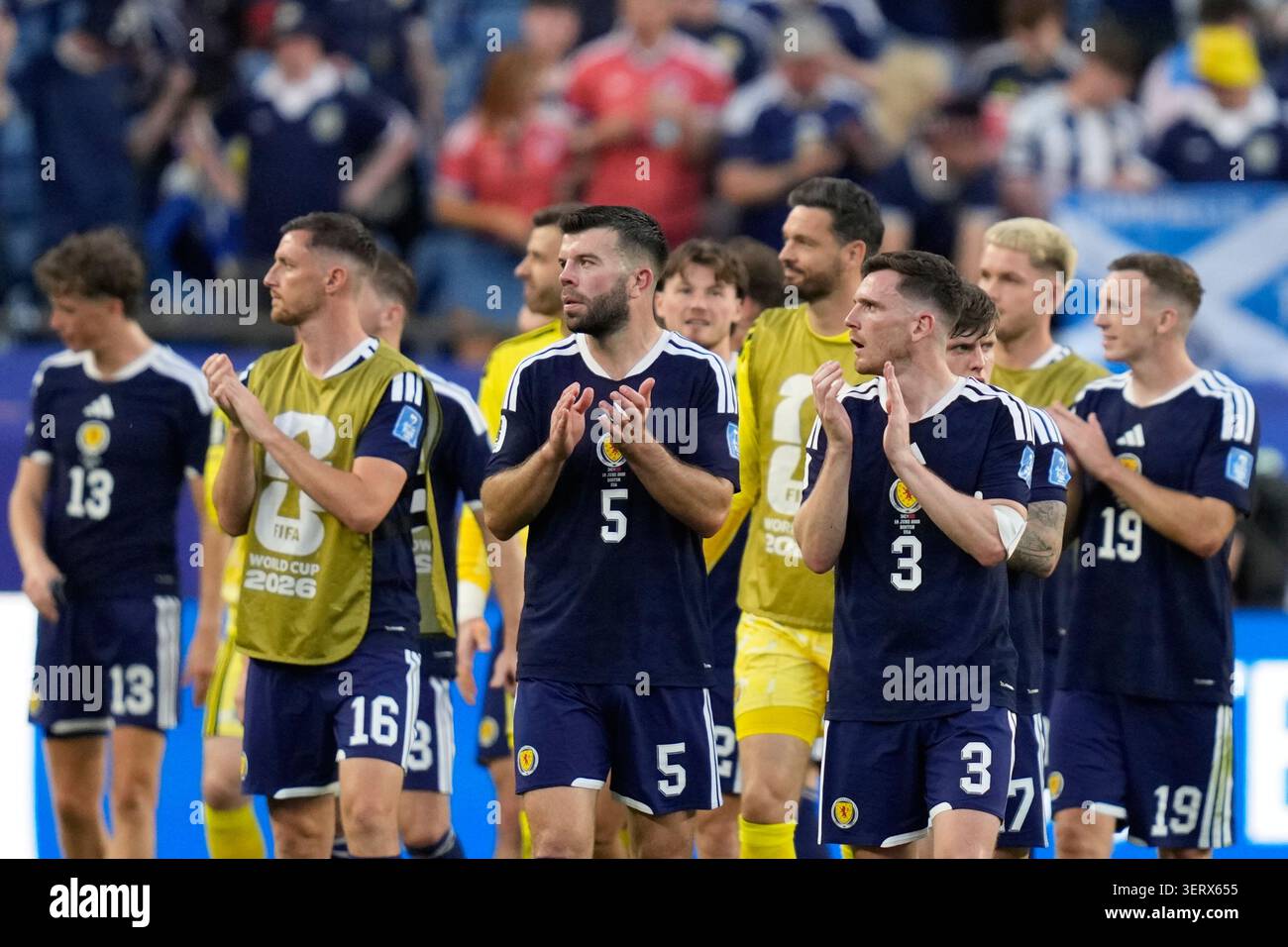 Scotland's players walk round the pitch applauding the fans after the ...