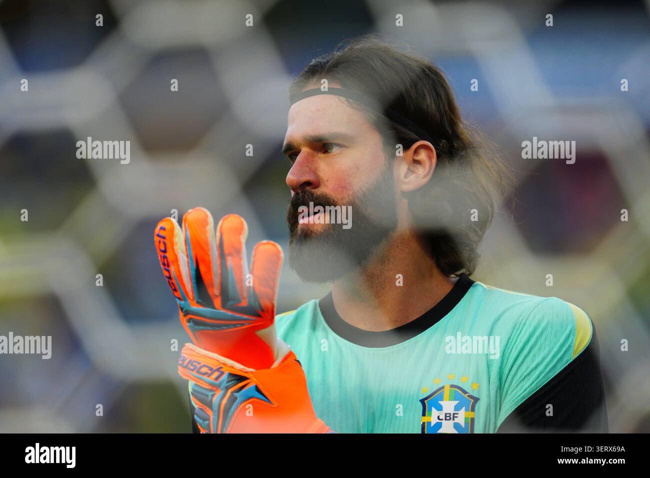 Brazil goalkeeper Alisson Becker warms up before the World Cup Group C ...