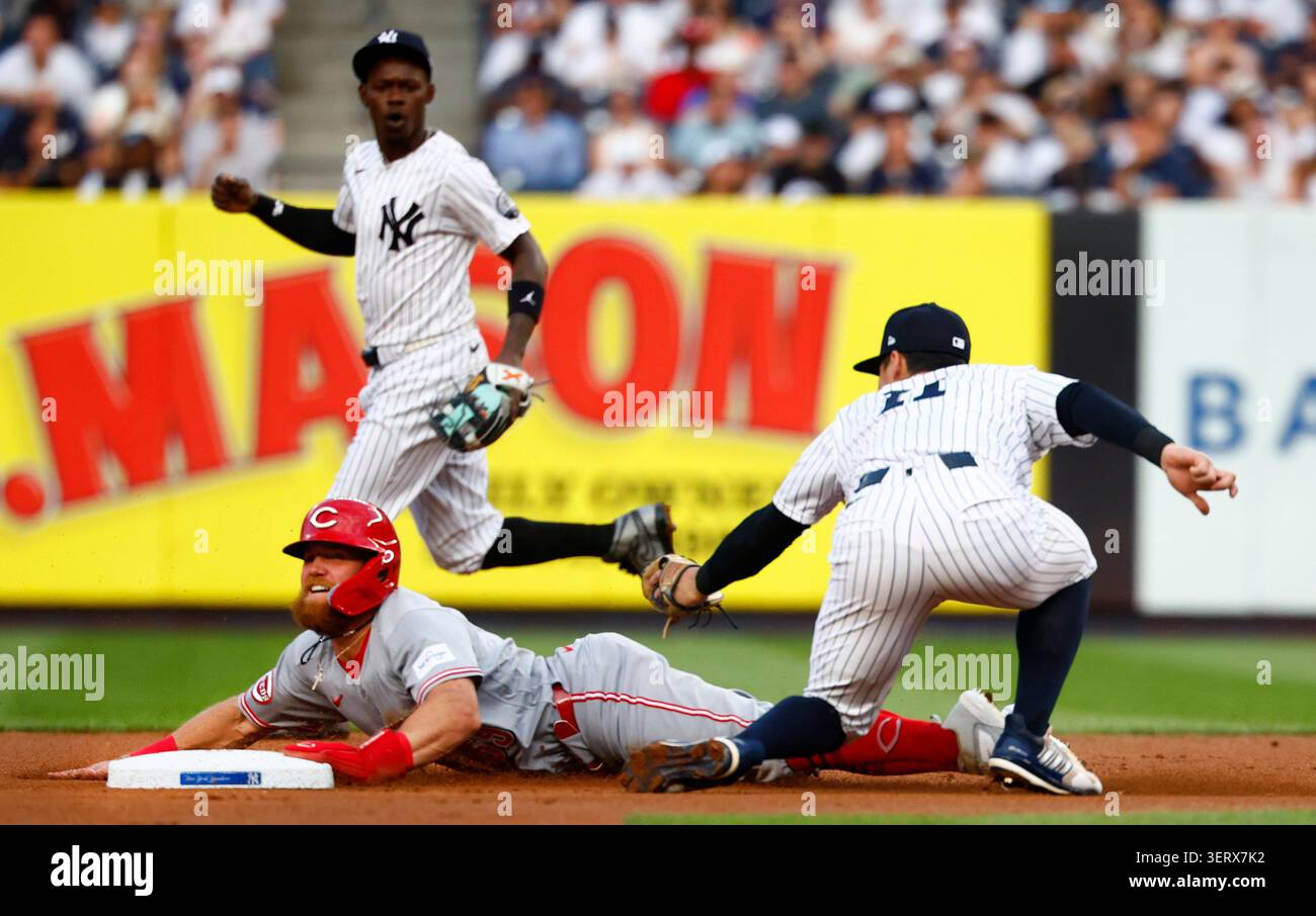 Cincinnati Reds' Blake Dunn, bottom left, reacts after being tagged out ...