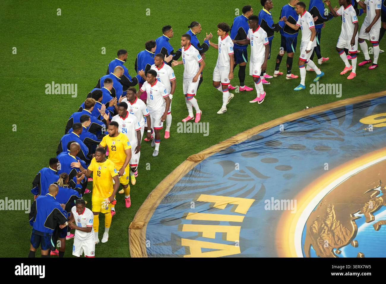 Haiti and Brazil players shake hands before the World Cup Group C ...