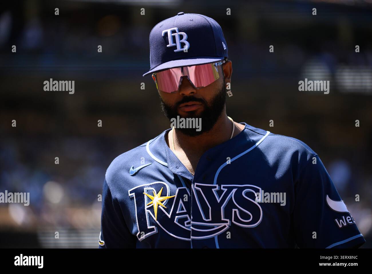Tampa Bay Rays Junior Caminero walks back to the dugout during a ...