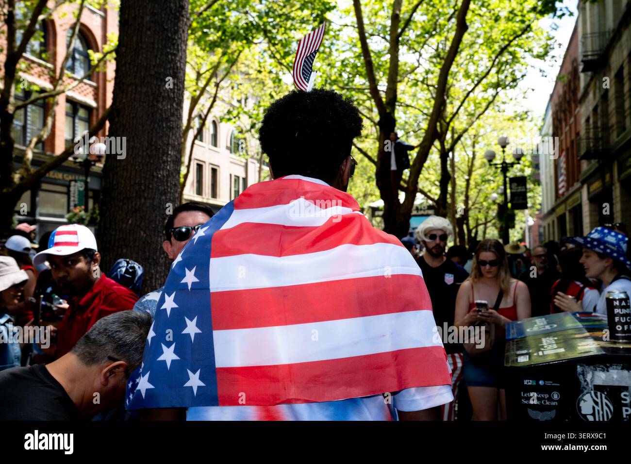 Seattle, USA. 19th Jun 2026. U.S. soccer fans cheer in Pioneer Square ...