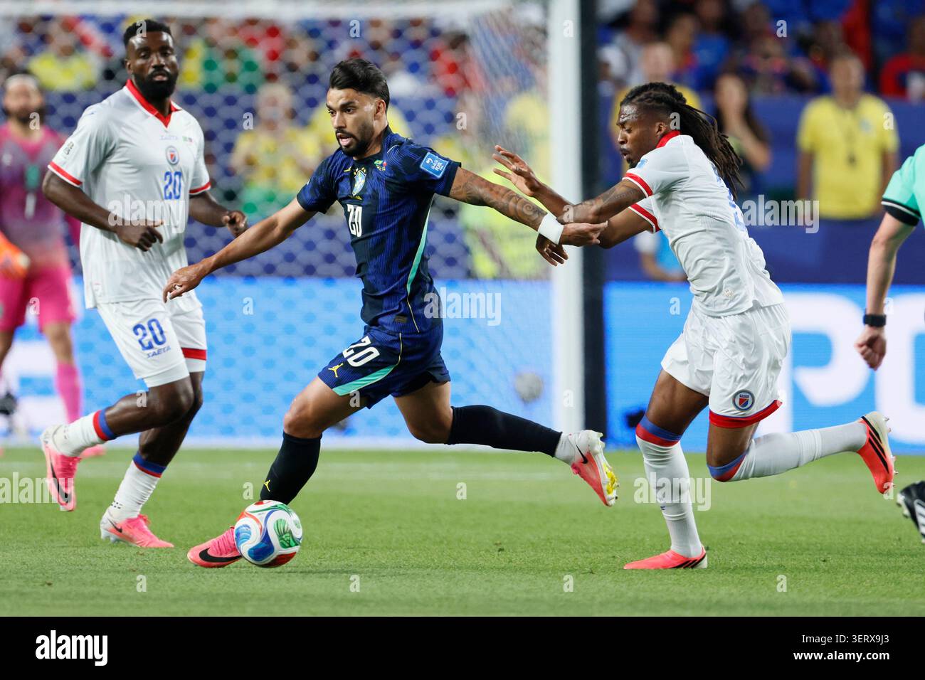 HLucas Paqueta of Brazil and Jean-Kevin Duverne of Haiti challenge ...