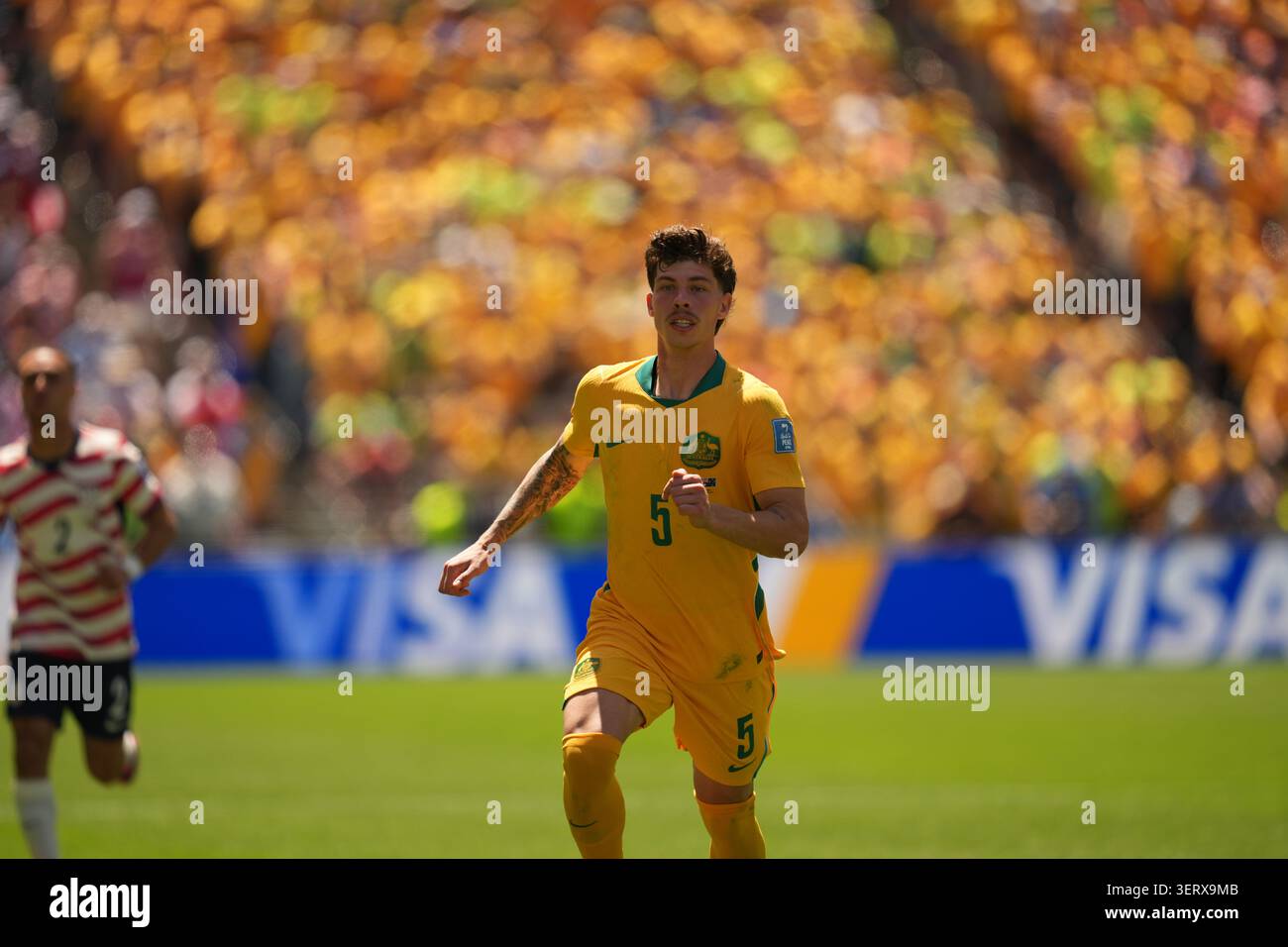 Australia's Jordan Bos (5) runs during the World Cup Group B soccer ...