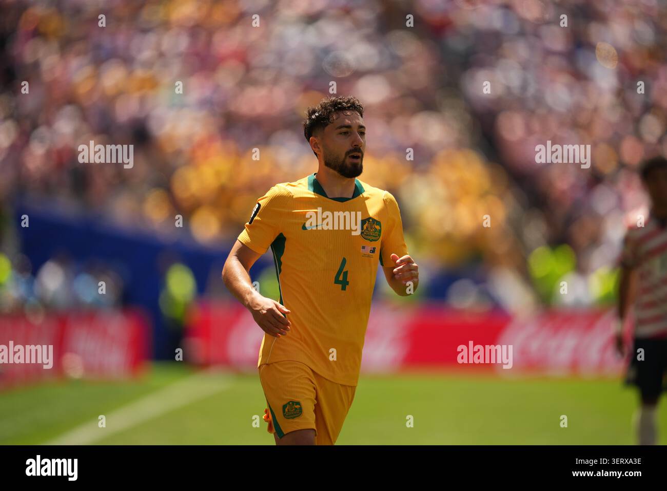 Australia's Jacob Italiano (4) runs during the World Cup Group B soccer ...