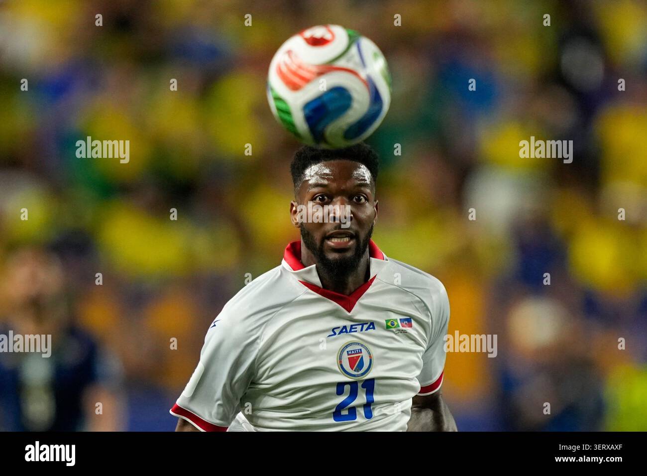 Haiti's Josue Casimir eyes the ball during the World Cup Group C soccer ...