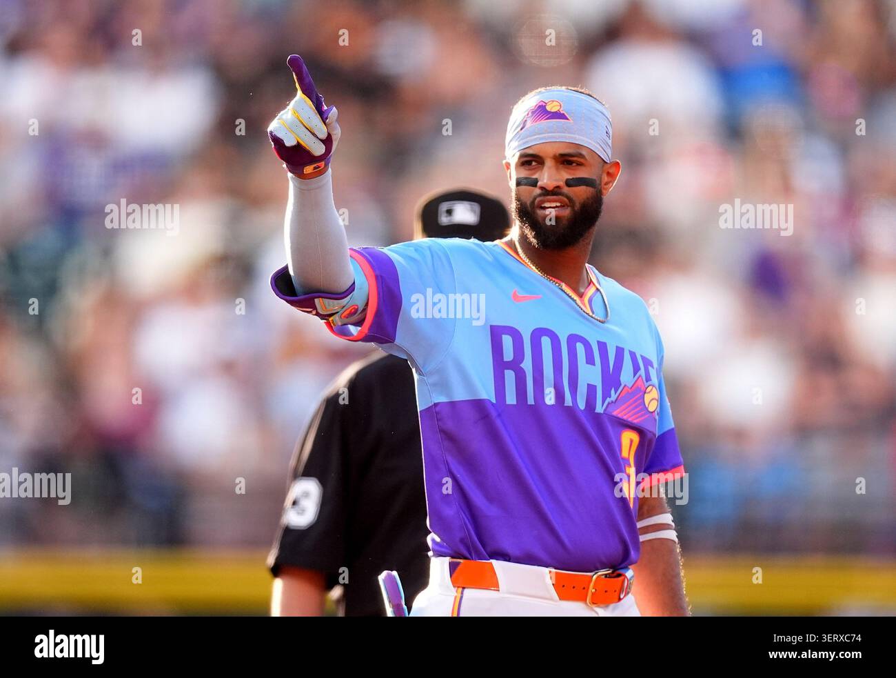 Colorado Rockies' Willi Castro gestures to the dugout after his RBI ...