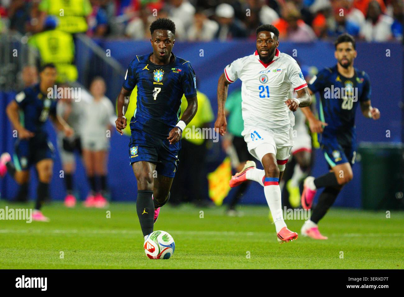 Brazil's Vinicius Junior (7) controls the ball against Haiti's Josue ...