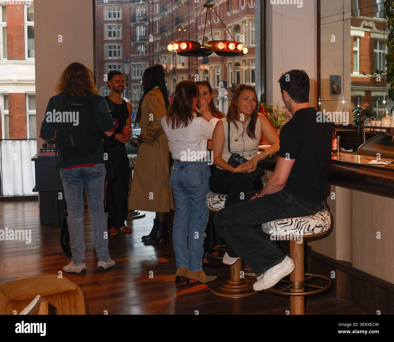 Guests attend the House Stories hosted by LaMont at the Maslow’s ...