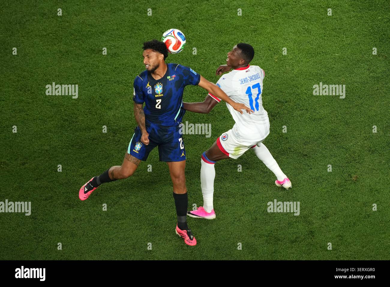 Brazil's Ederson Silva (2) challenges for the ball with Haiti's Danley ...