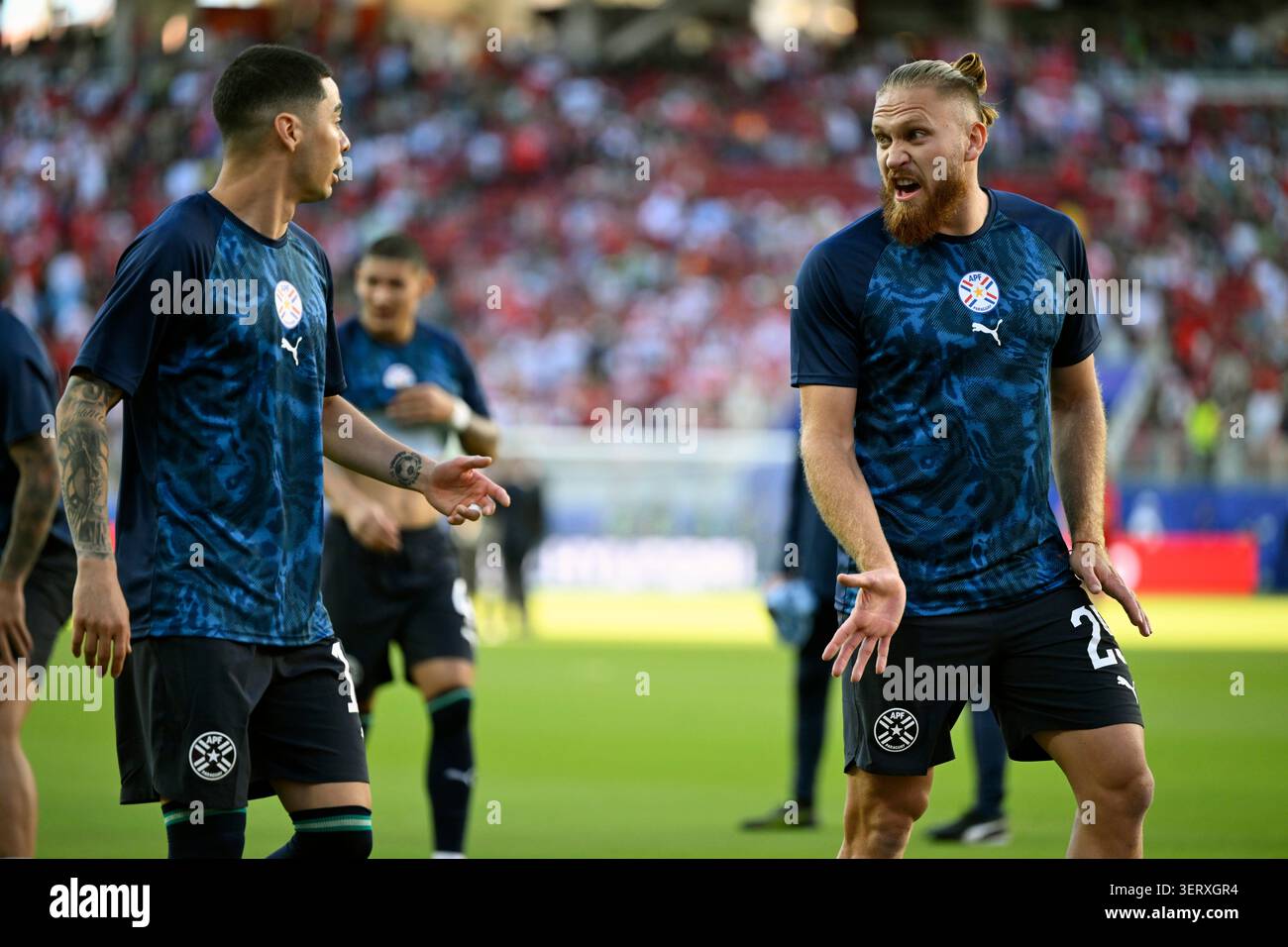 Paraguay's Miguel Almiron, left, and Paraguay's Isidro Pitta talk ...