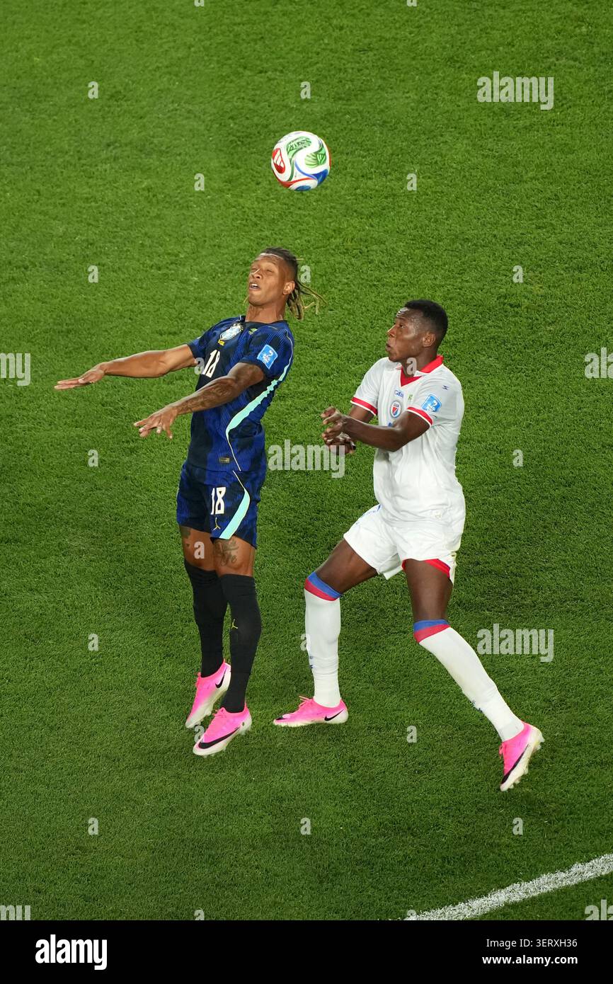 Brazil's Danilo Santos (18) heads the ball against Haiti's Danley Jean ...