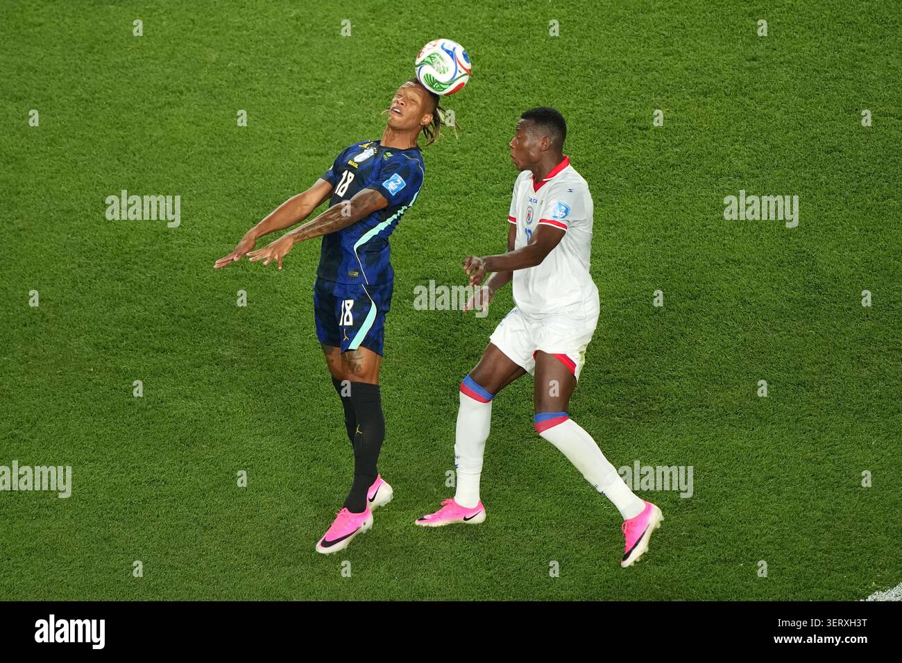 Brazil's Danilo Santos (18) heads the ball against Haiti's Danley Jean ...