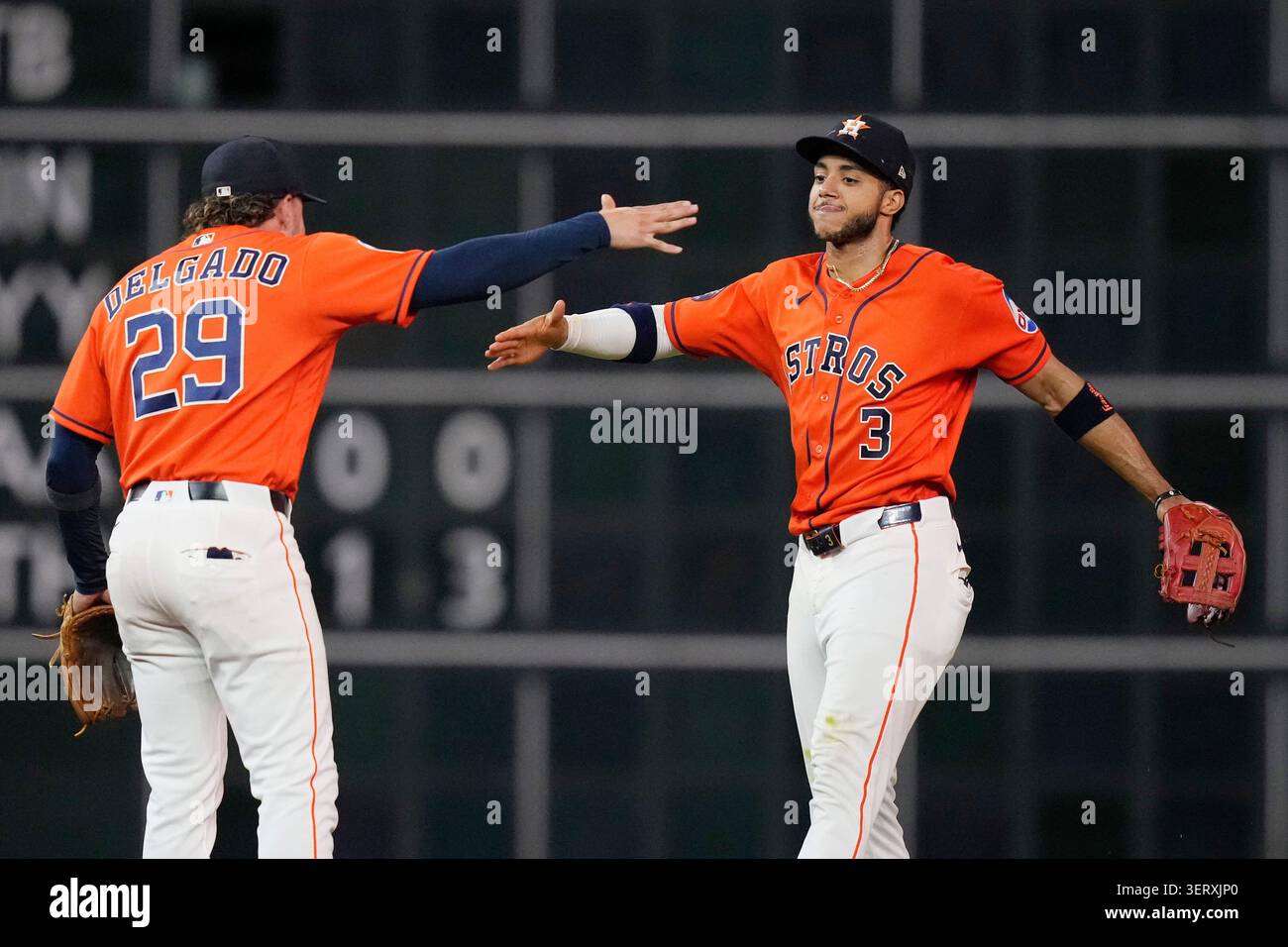 Houston Astros second baseman Raynel Delgado (29) and shortstop Jeremy ...