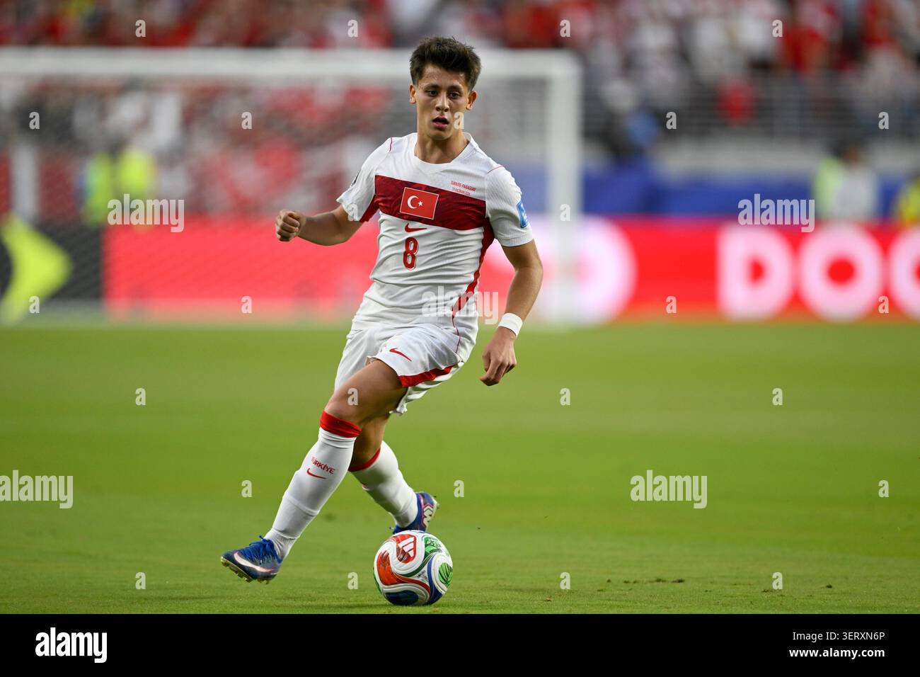 Turkey's Arda Guler (8) controls the ball during the World Cup Group D ...