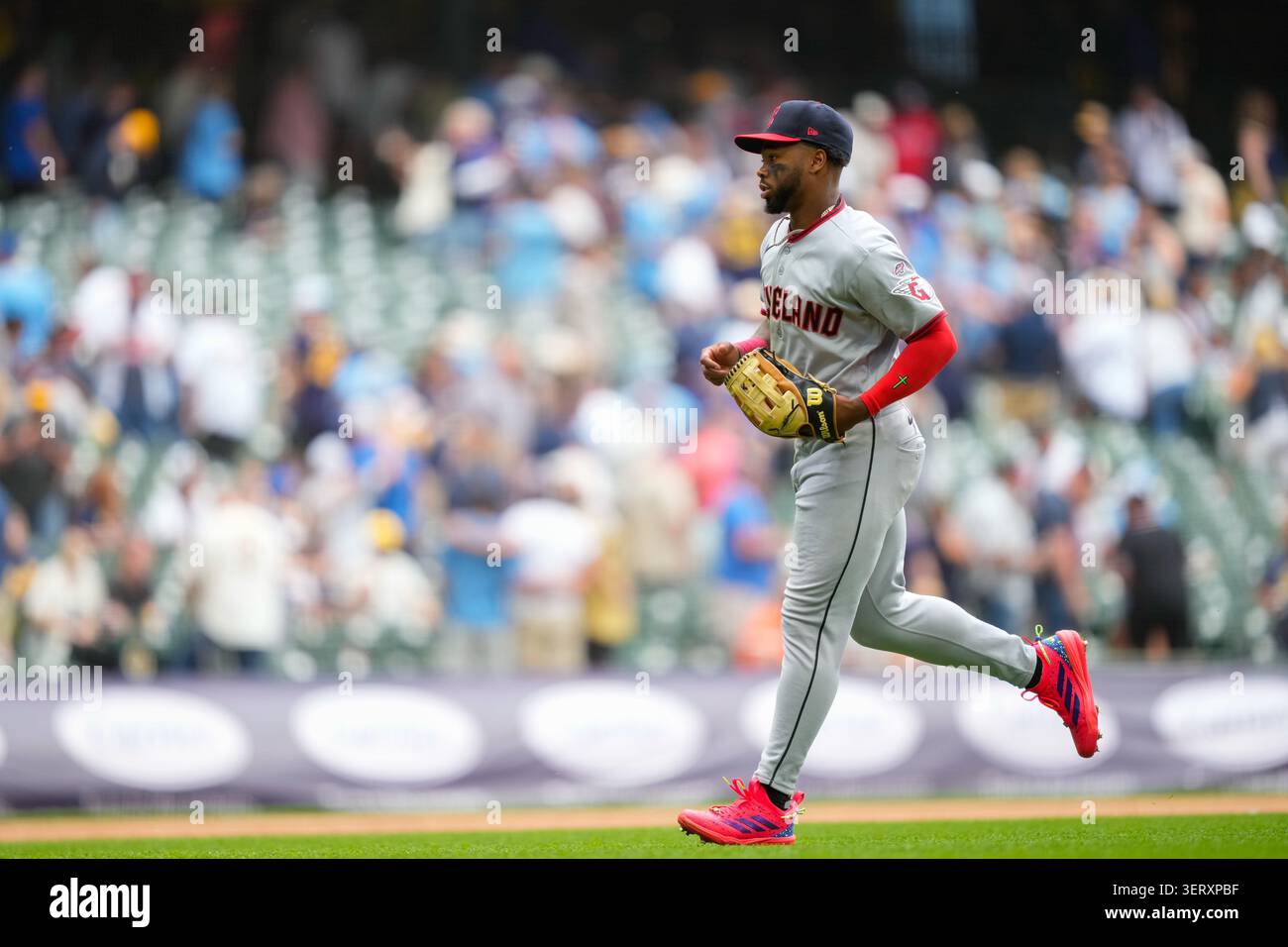 Cleveland Guardians outfielder Kahlil Watson runs off the field after ...