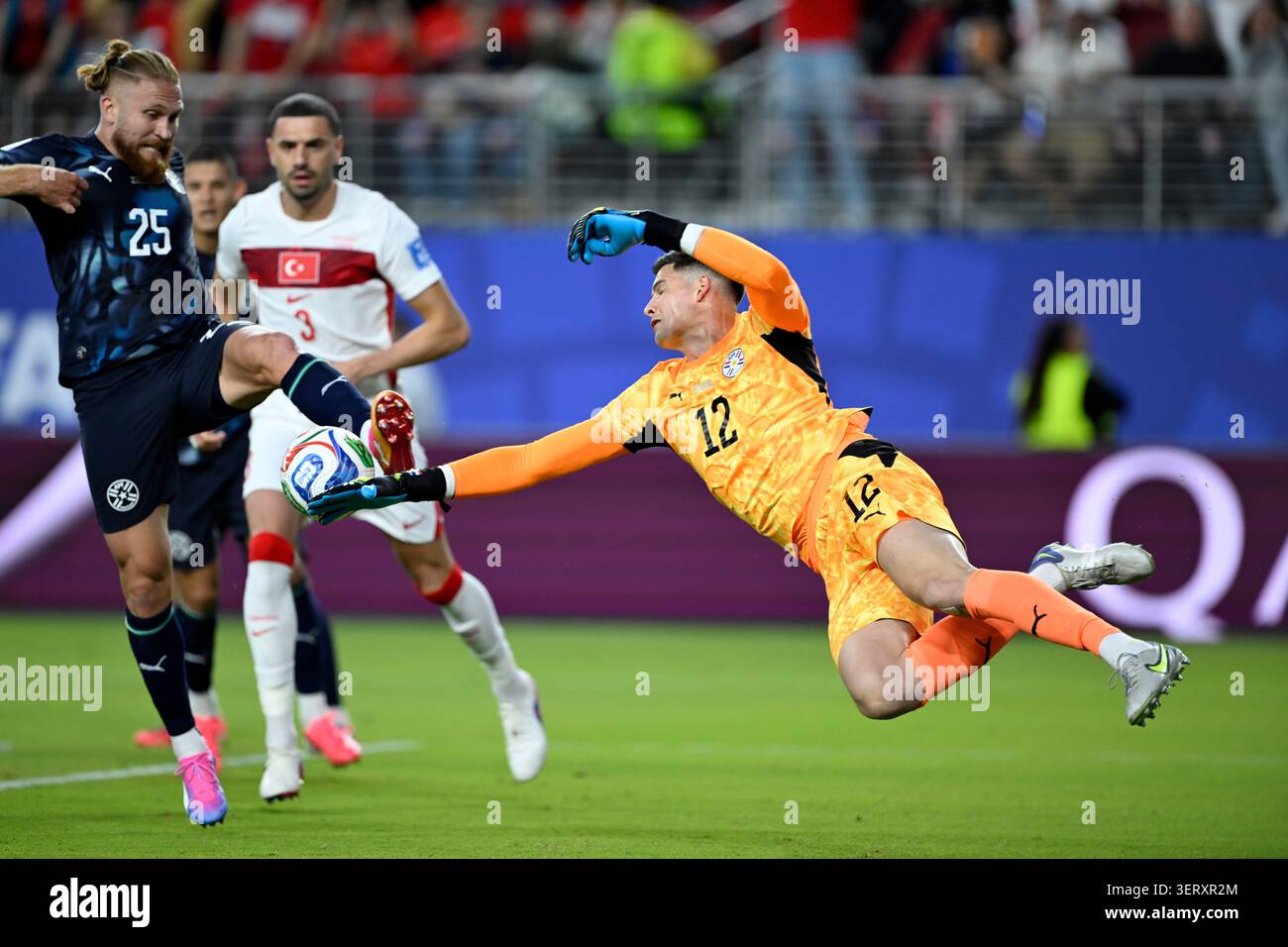 Paraguay goalkeeper Orlando Gill (12) and Isidro Pitta (25) clear the ...