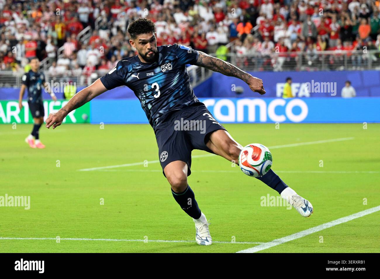 Paraguay's Omar Alderete (3) controls the ball during the World Cup ...