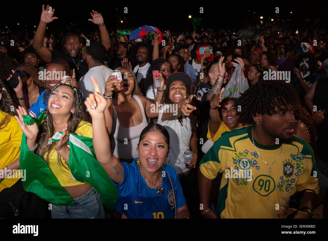 Fans watch Brazil vs. Haiti play in the FIFA World Cup in Boston Common ...