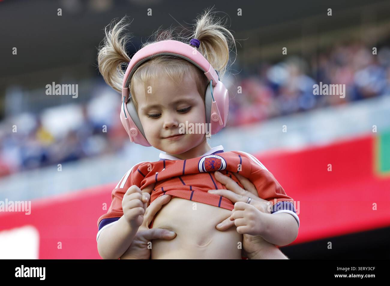 FOXBOROUGH - A very young Scottish football supporter with ear ...