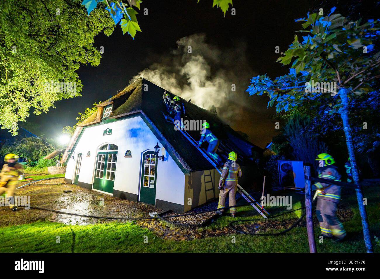 UDDEL - Firefighters at a home in Uddel. The fire in a home with a ...