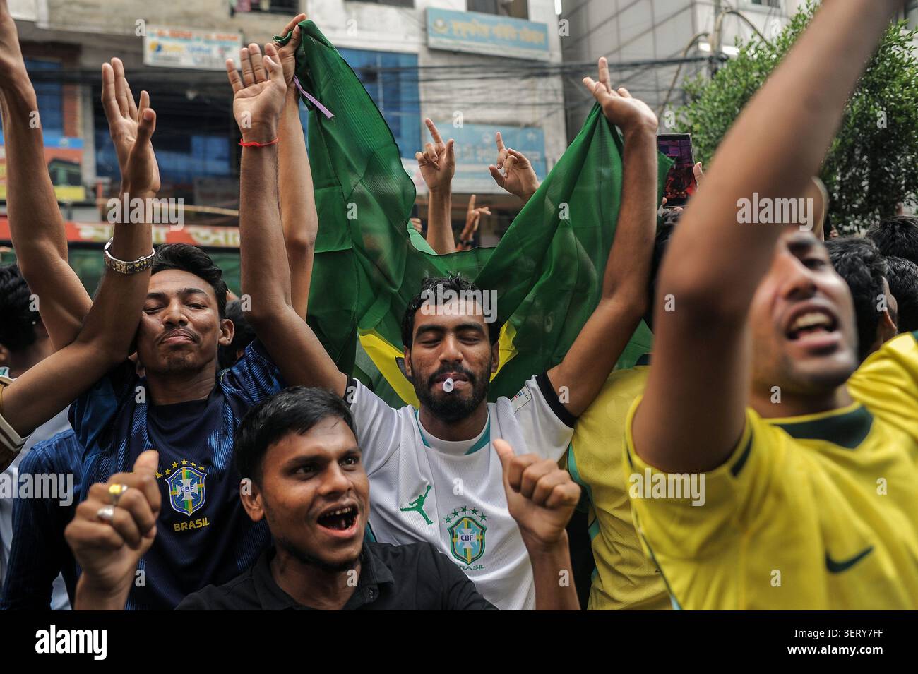 Brazilian fans of Bangladeshi origin celebrate Brazil's 3-0 victory ...