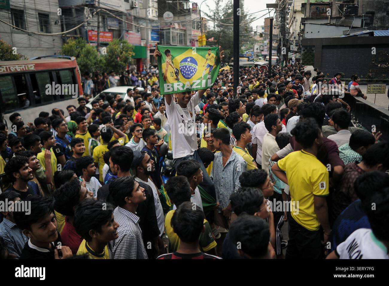 Brazilian fans of Bangladeshi origin celebrate Brazil's 3-0 victory ...