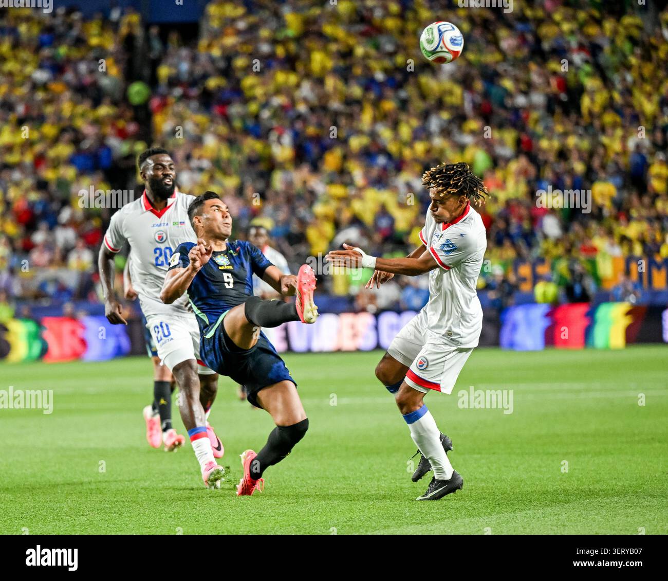 Matheus Cunha (#9) and Martin Expérience battle for the ball during the ...