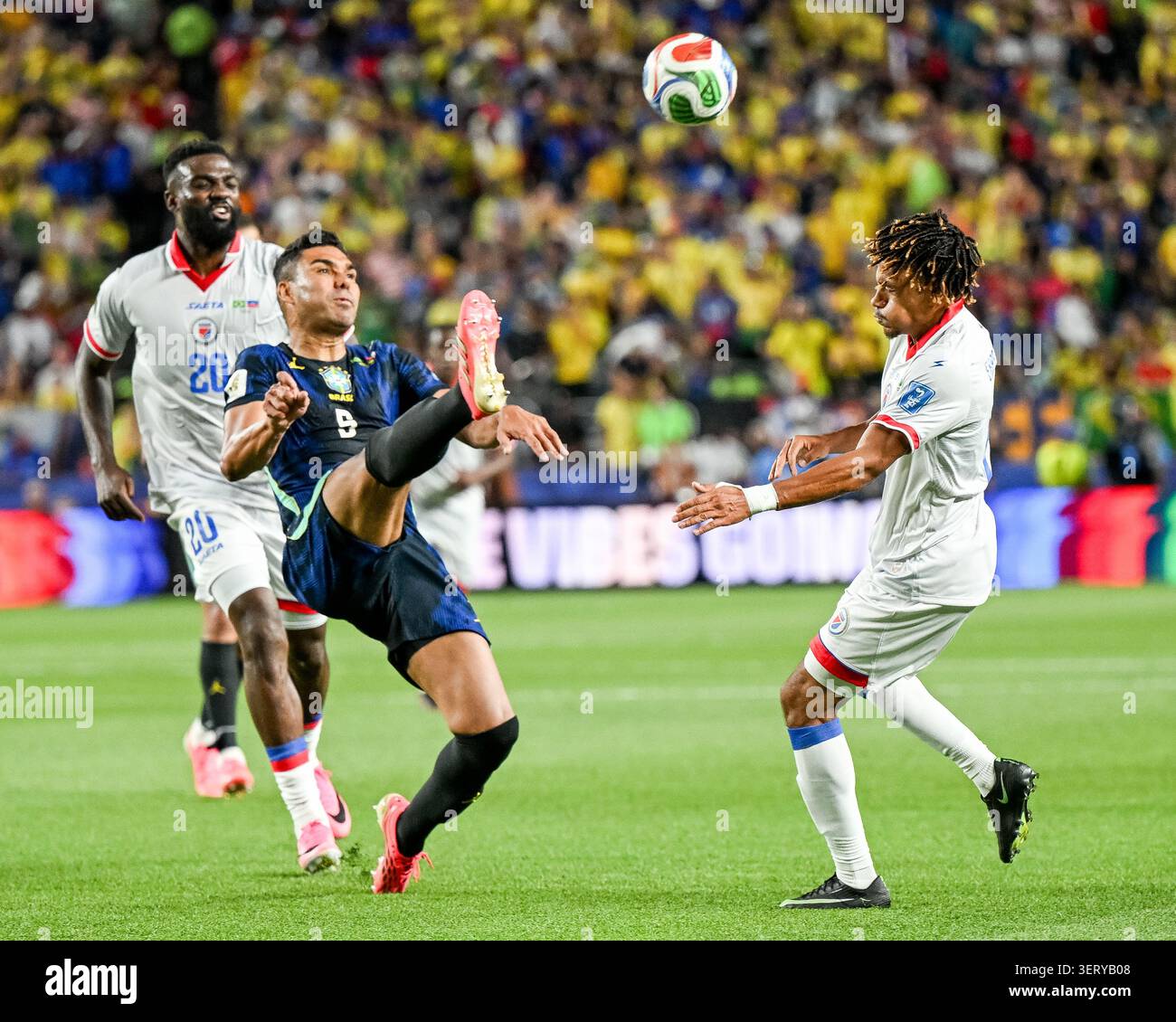 Matheus Cunha (#9) and Martin Expérience battle for the ball during the ...