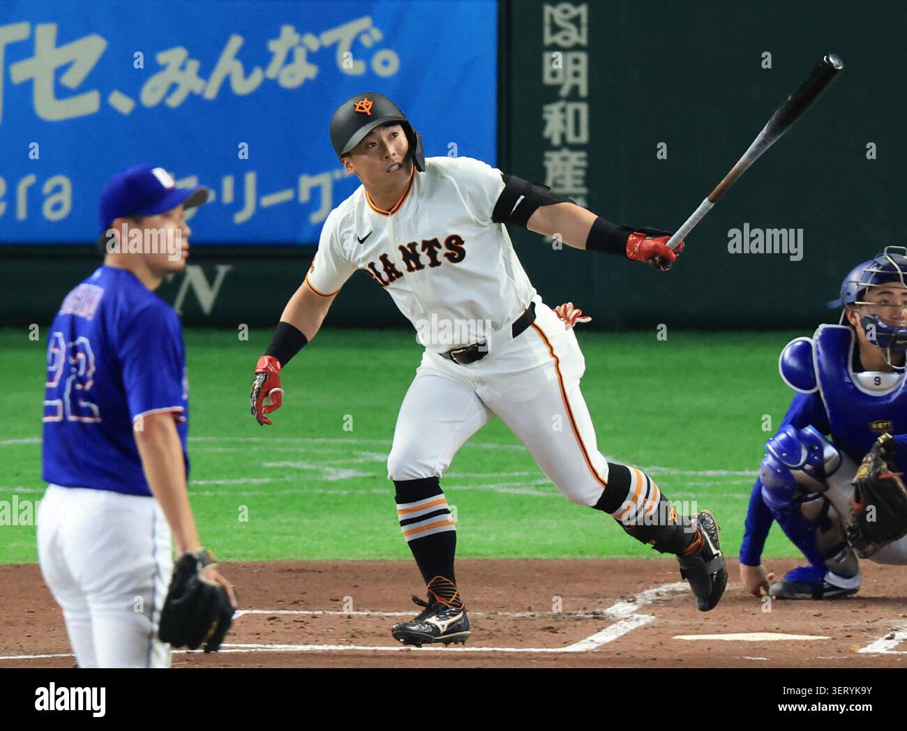 Tokyo Giants left fielder Shogo Asano hits a home run during the 3rd ...