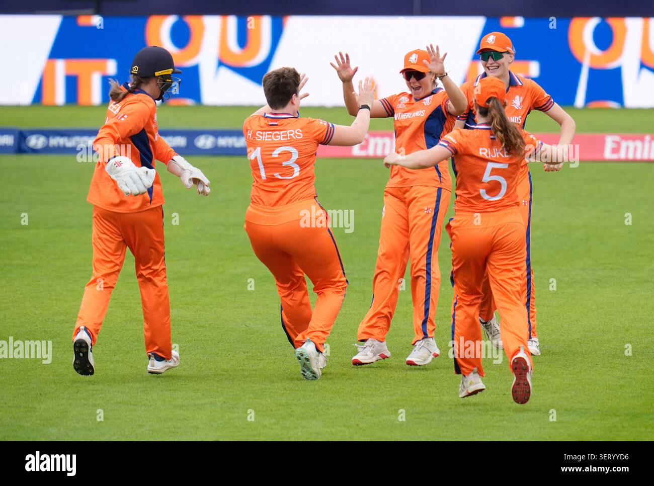 Netherland's Sterre Kalis (centre) celebrates catching out Australia's ...