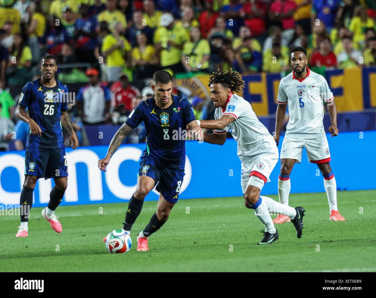 Bruno Guimarães (L) of Brazil and Martin Yves Expérience (R) of Haiti ...