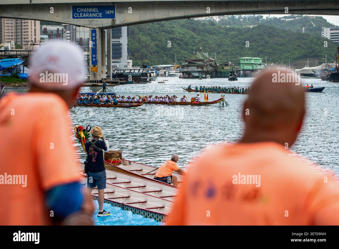 Onlookers await the start of the Dragon Boat race in Aberdeen. Races ...