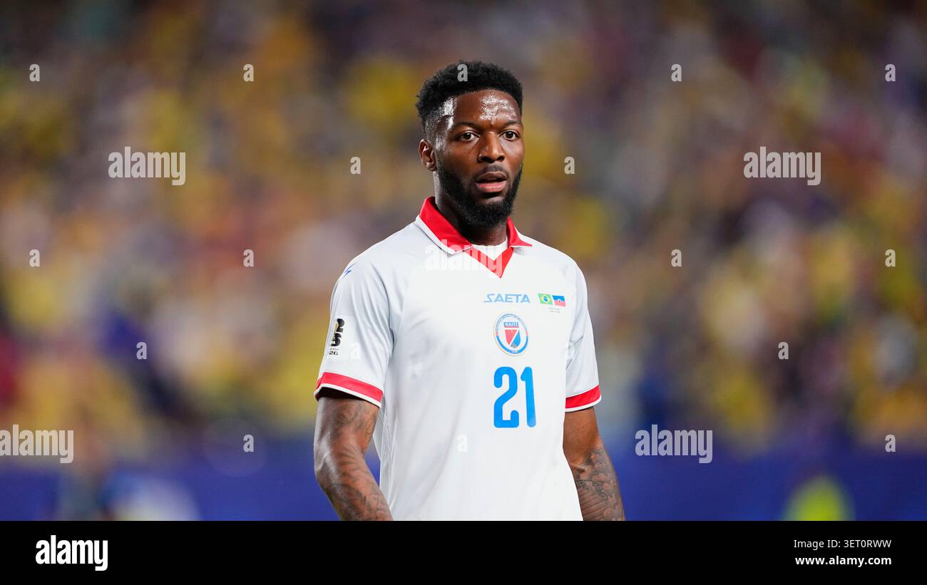 Haiti's Josue Casimir (21) in action during the World Cup Group C ...