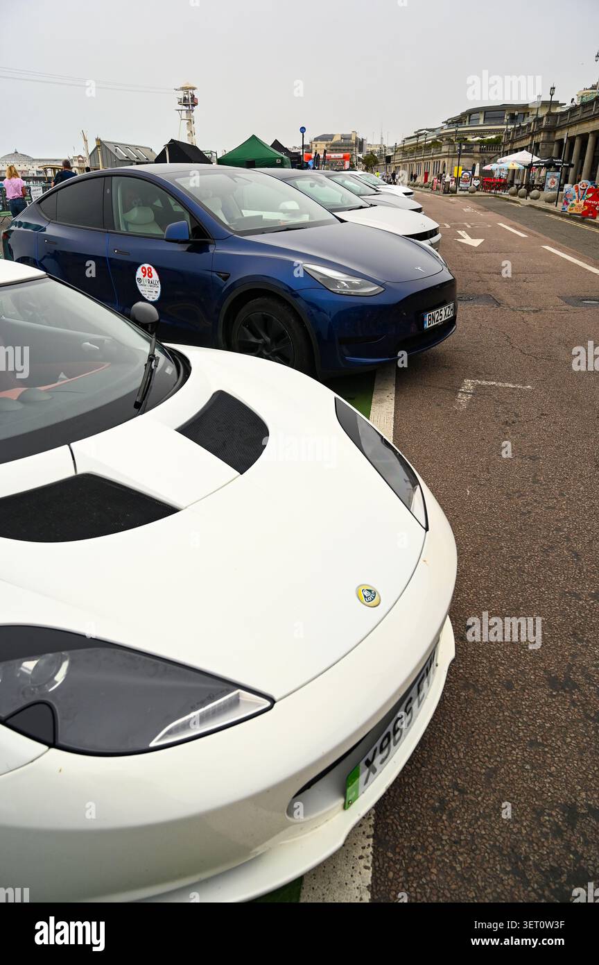 Brighton UK 20th June 2026 - Visitors take a look at cars taking part ...
