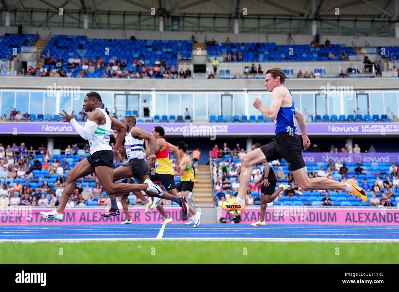 Runners competing during the heat 6 of the Men's 100m during day one of ...