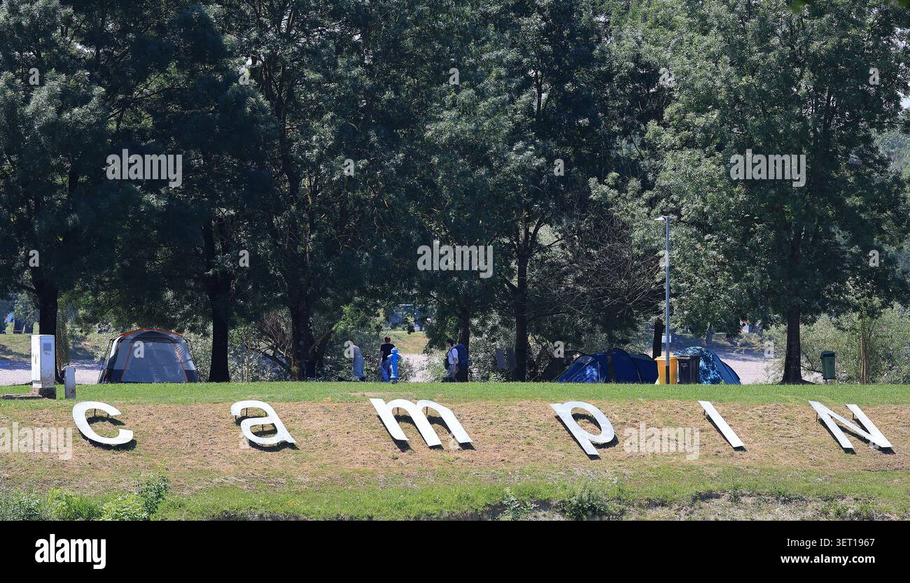 Tents and barriers set up for INMusic Festival held at Lake Jarun in ...