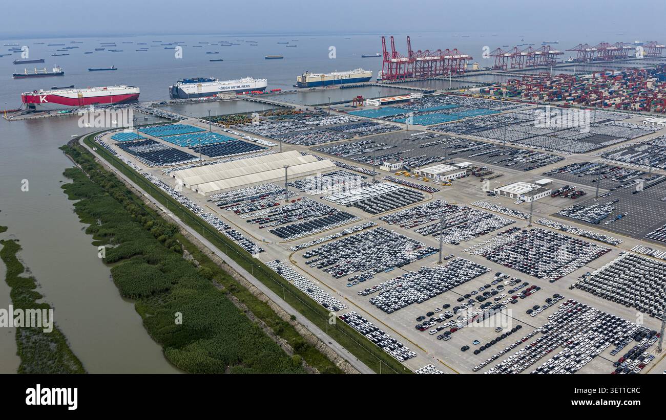 A specialized car carrier loads vehicles for overseas markets at ...