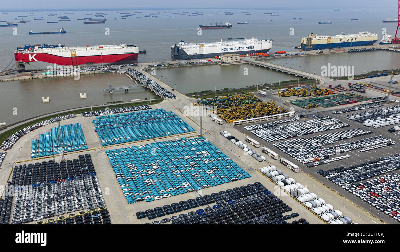 A specialized car carrier loads vehicles for overseas markets at ...