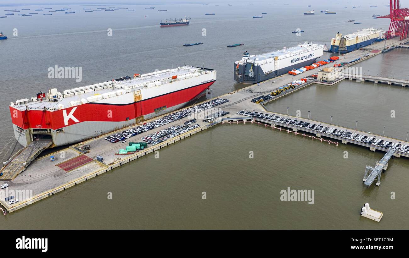 A specialized car carrier loads vehicles for overseas markets at ...