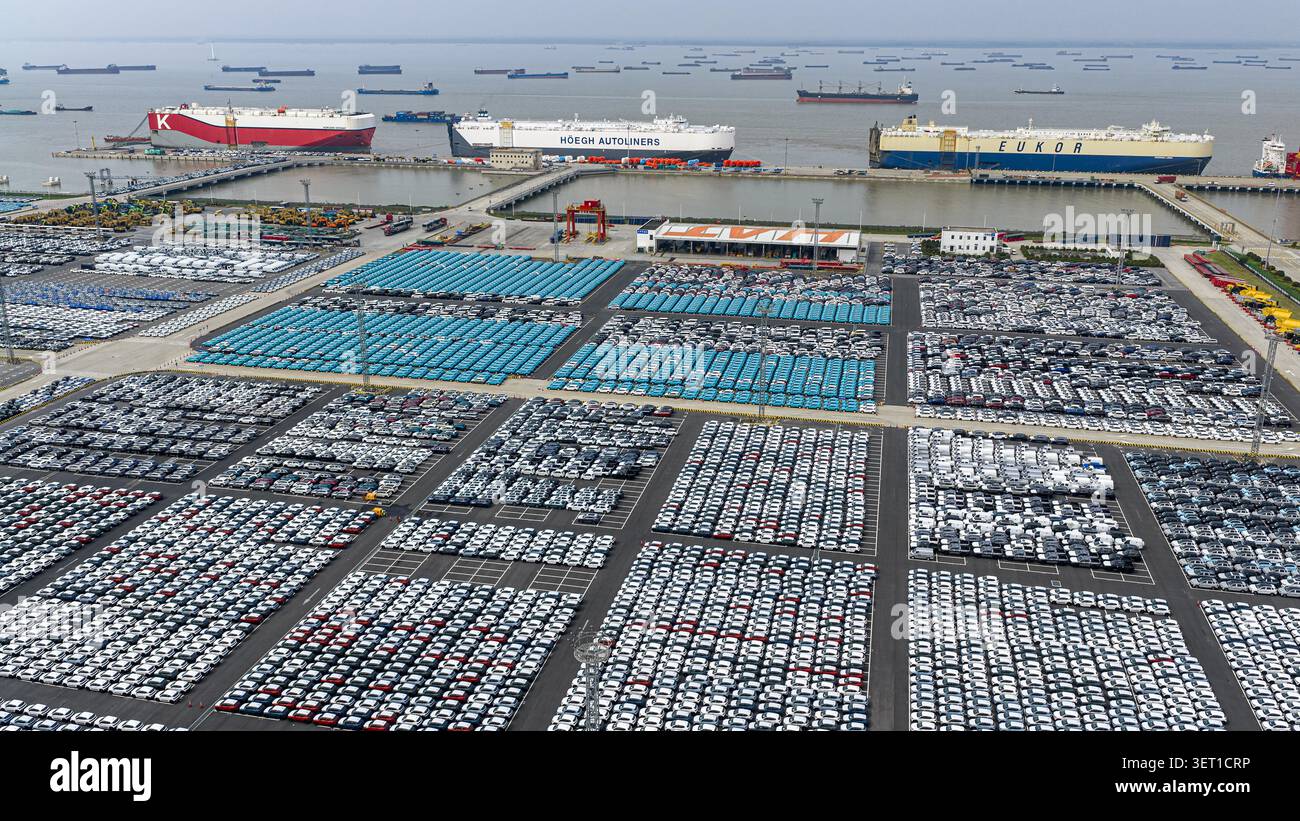 A specialized car carrier loads vehicles for overseas markets at ...